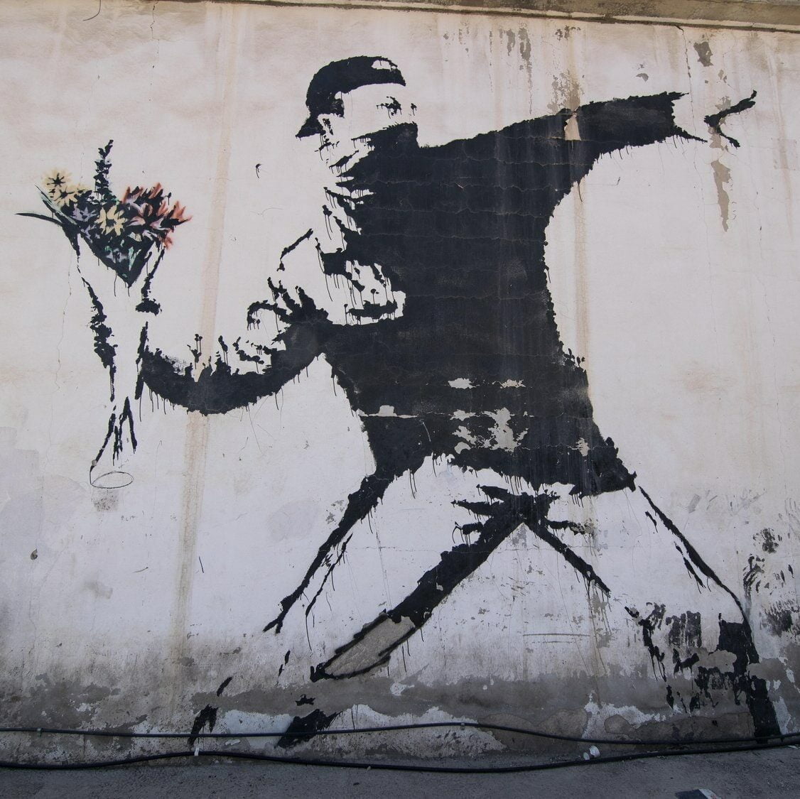 Comment Banksy, l'artiste de street art mystérieux, a révolutionné l ...
